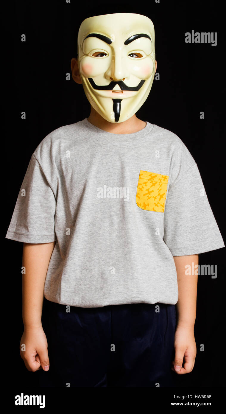 A Man Wearing Vendetta Mask in Isolated Black Background Stock Photo ...