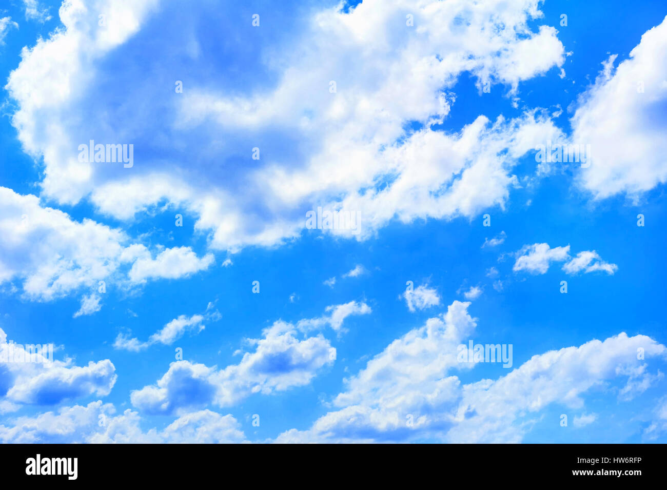 Bright white clouds in blue sky Stock Photo - Alamy