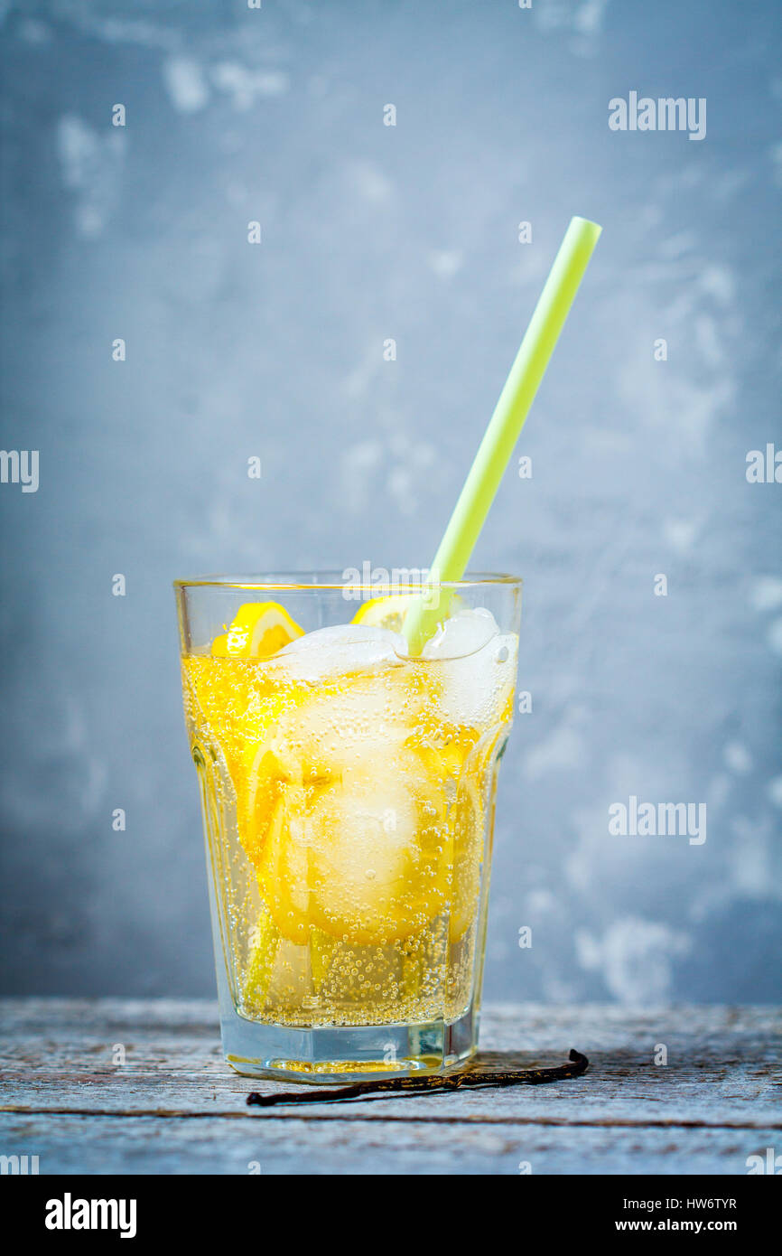 Cold vanilla lemonade with lemons and ice Stock Photo - Alamy