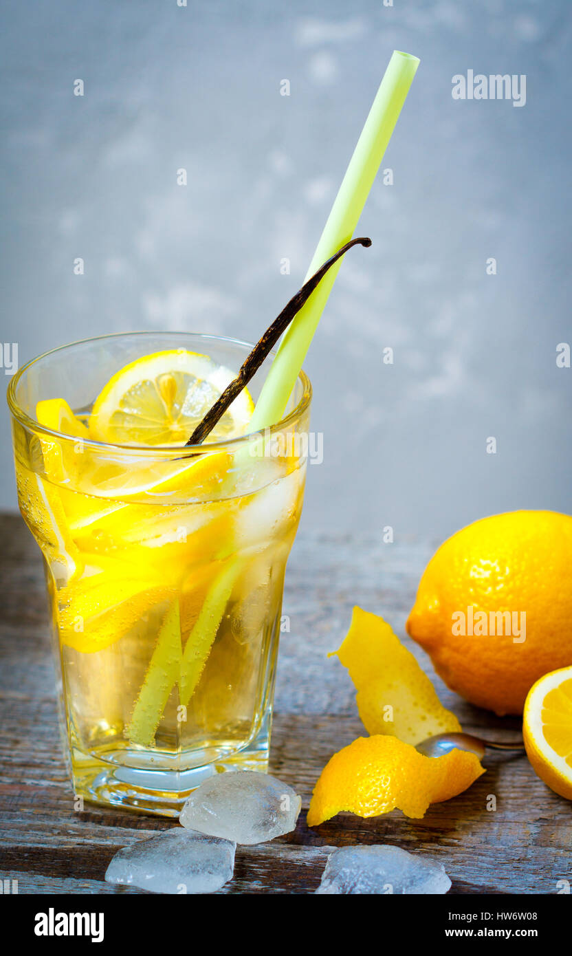 Cold vanilla lemonade with lemons and ice Stock Photo - Alamy