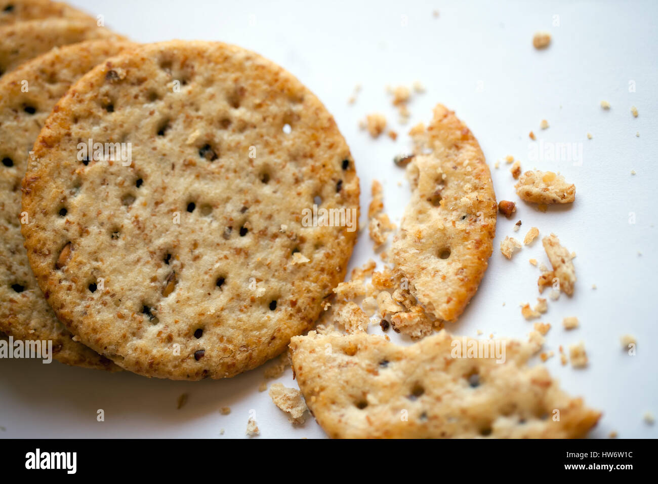 Wholewheat crackers on white background Stock Photo - Alamy
