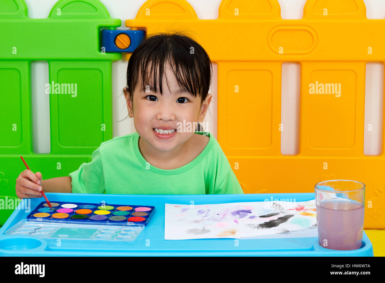 Asian Little Chinese Girl Washing Painting Brush in Water Stock Photo ...