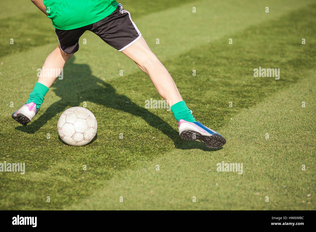 Close up football and feet running hi-res stock photography and images ...