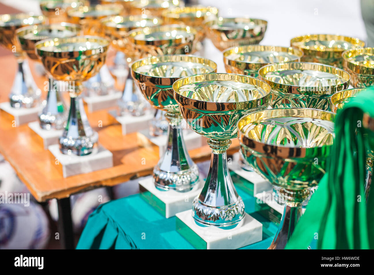 Golden winner trophy cups hi-res stock photography and images - Alamy