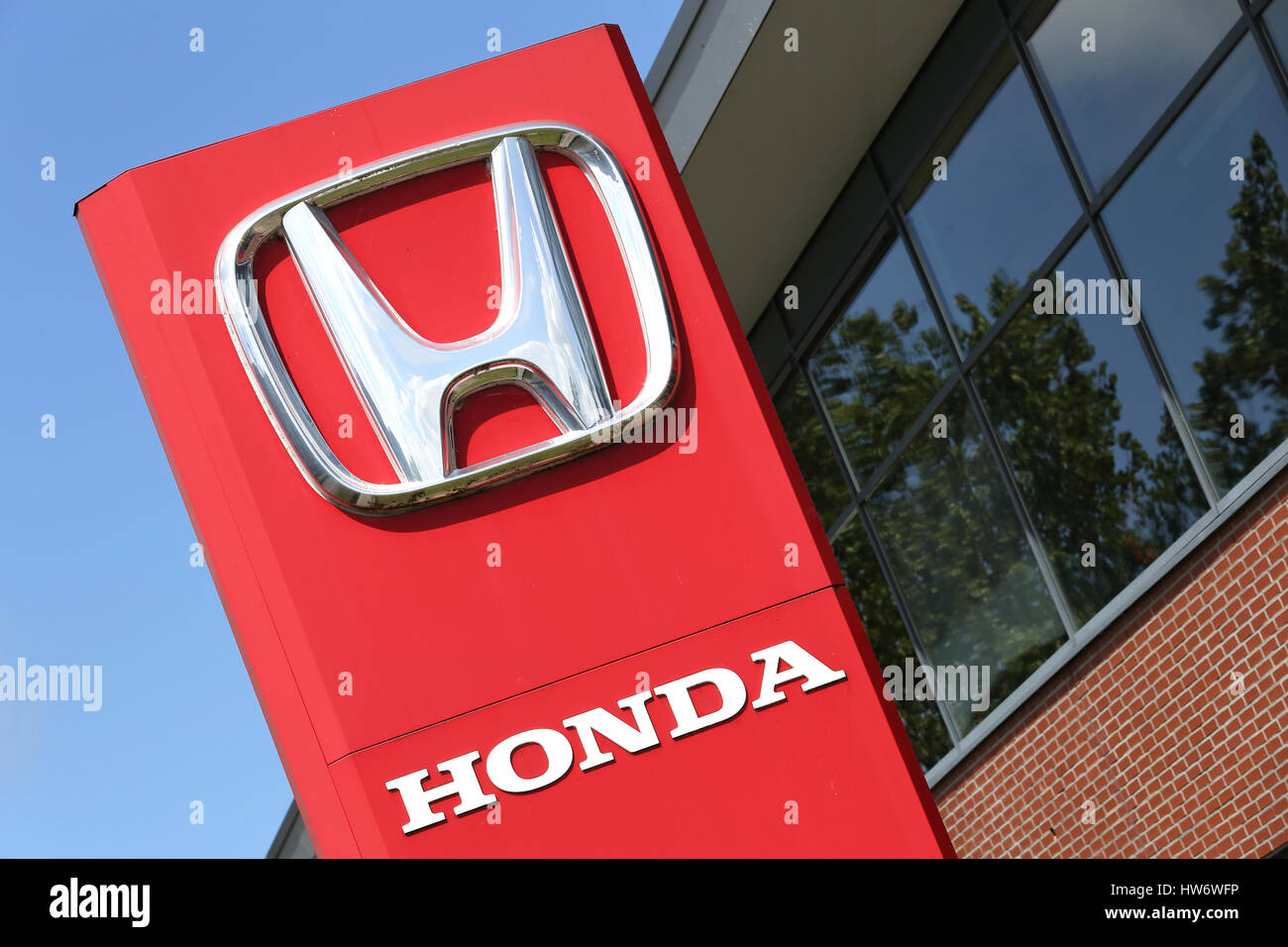 Honda dealership sign in front of the showroom Stock Photo - Alamy