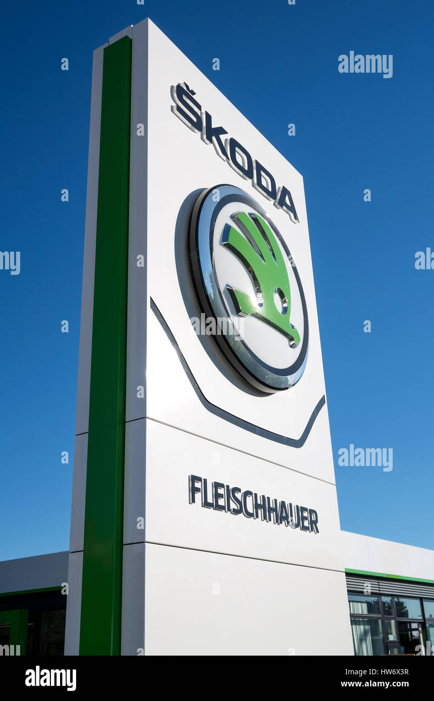 Skoda dealership sign in front of the showroom Stock Photo - Alamy