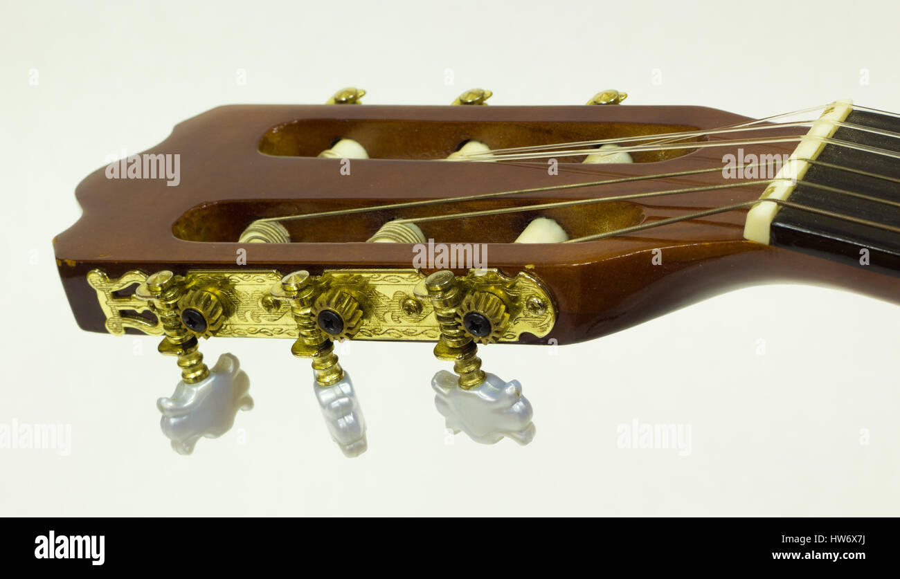 Tuning knobs on a guitar head Stock Photo - Alamy