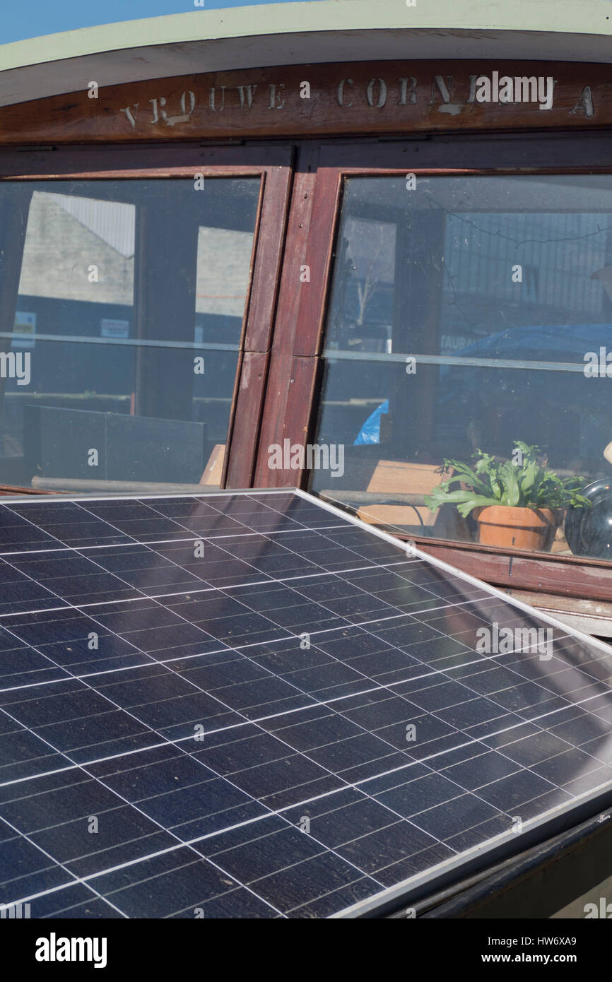Barges with solar panels on the canal by the Olympic Park in the east ...