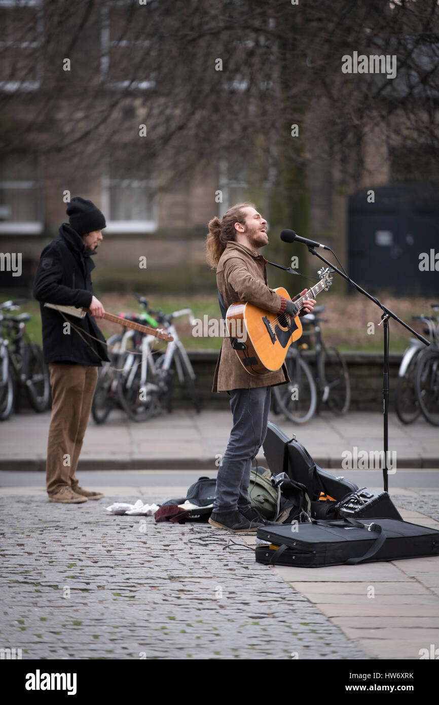 Male street busker guitar singing hi-res stock photography and images ...