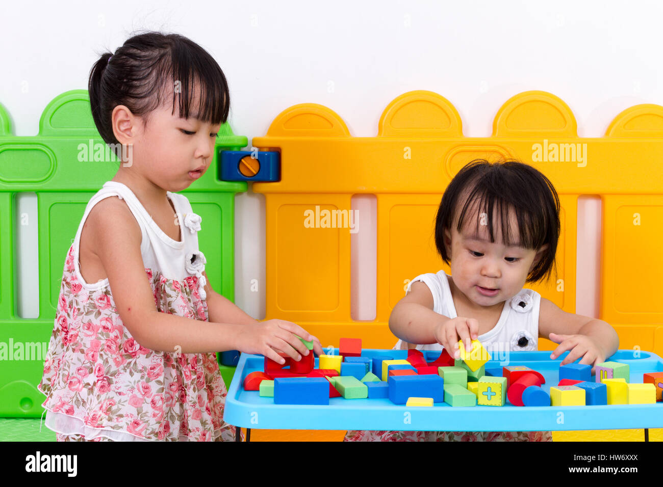 Asian Little Chinese Girls Playing Wooden Blocks at Home or ...
