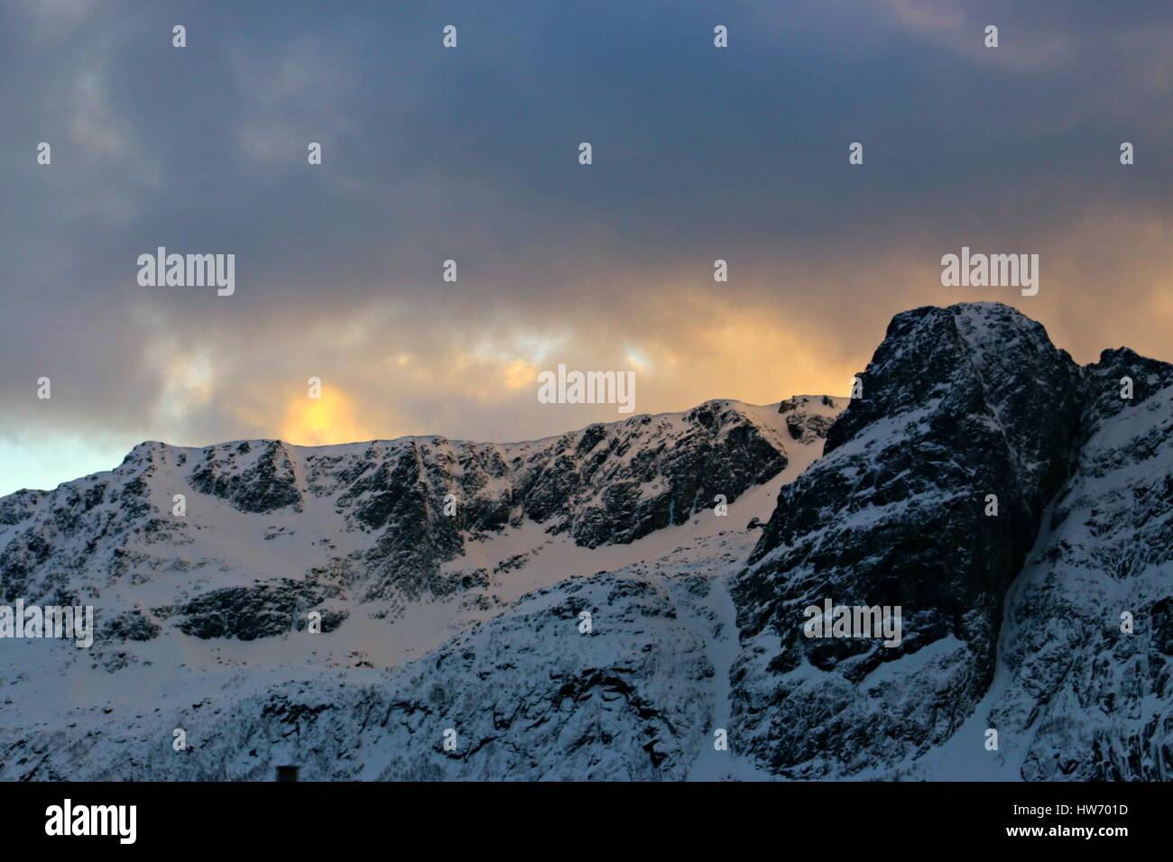 Sunset over mountains Stock Photo - Alamy