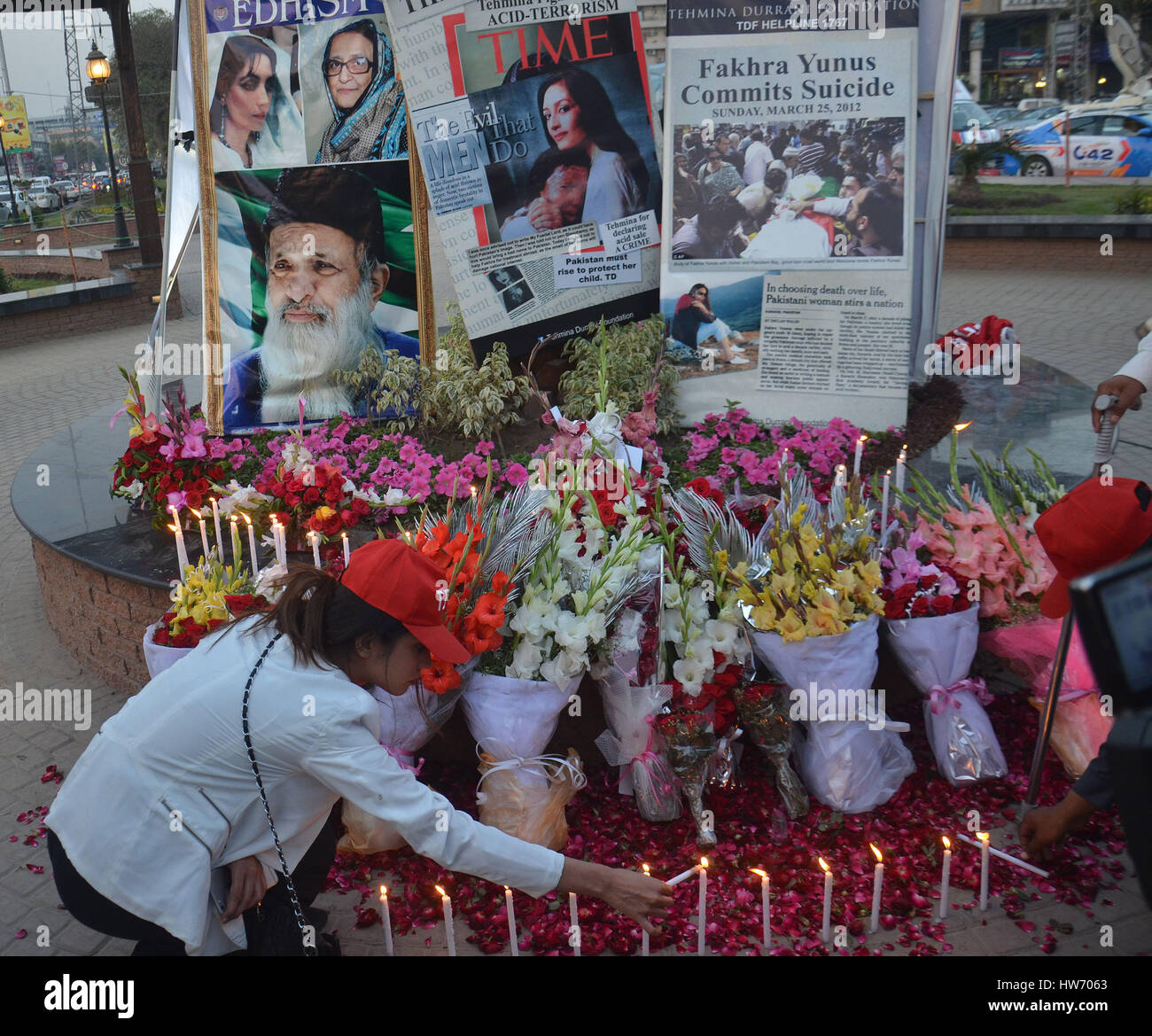 Pakistani civil society women activist lighting candles during a vigil ...
