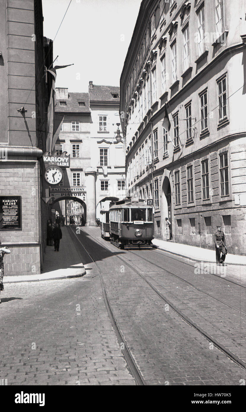 1938, historical, view of a tram in one of the back streets of Prague ...