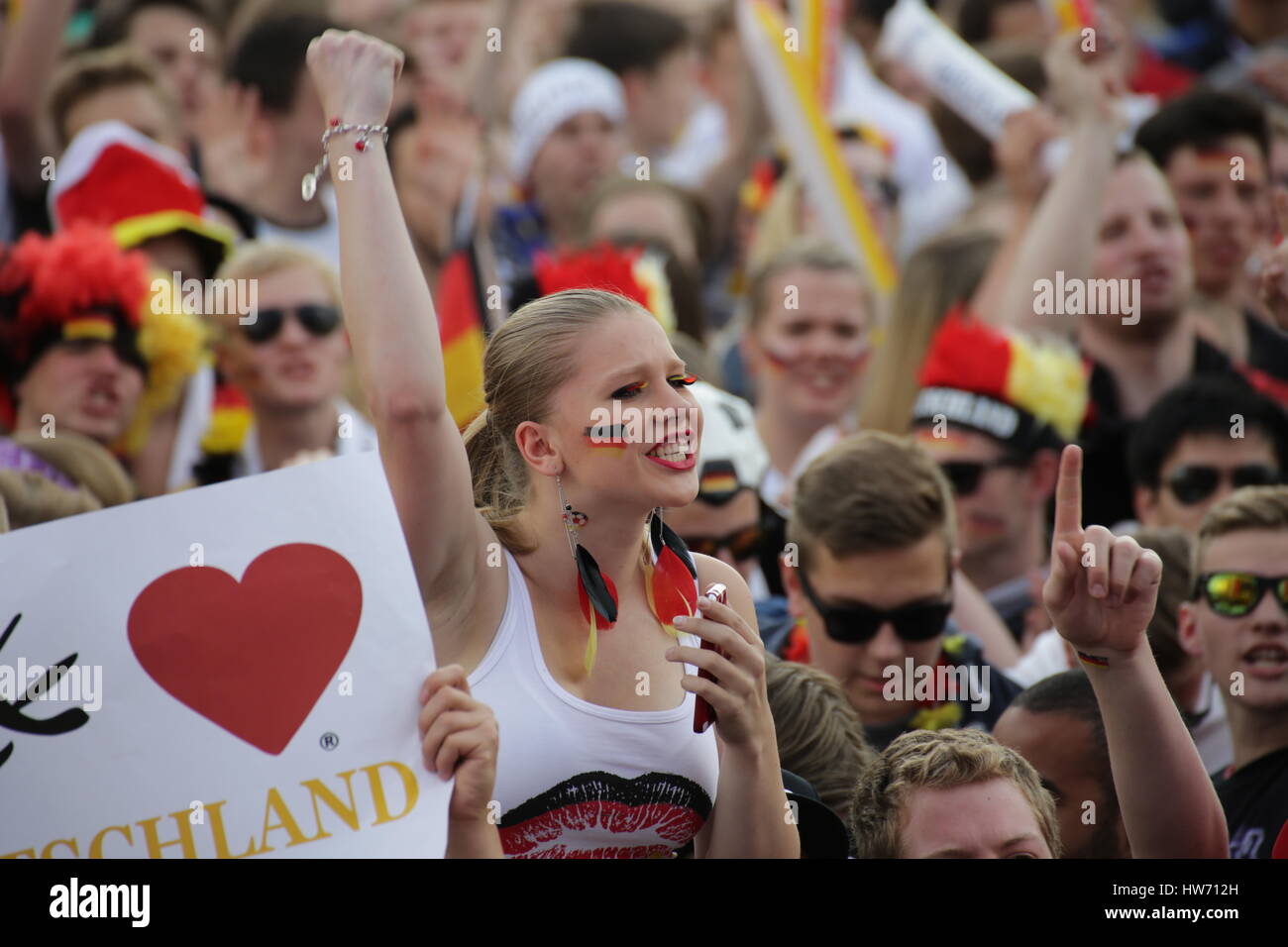 German fans wave germany flag hi-res stock photography and images - Alamy