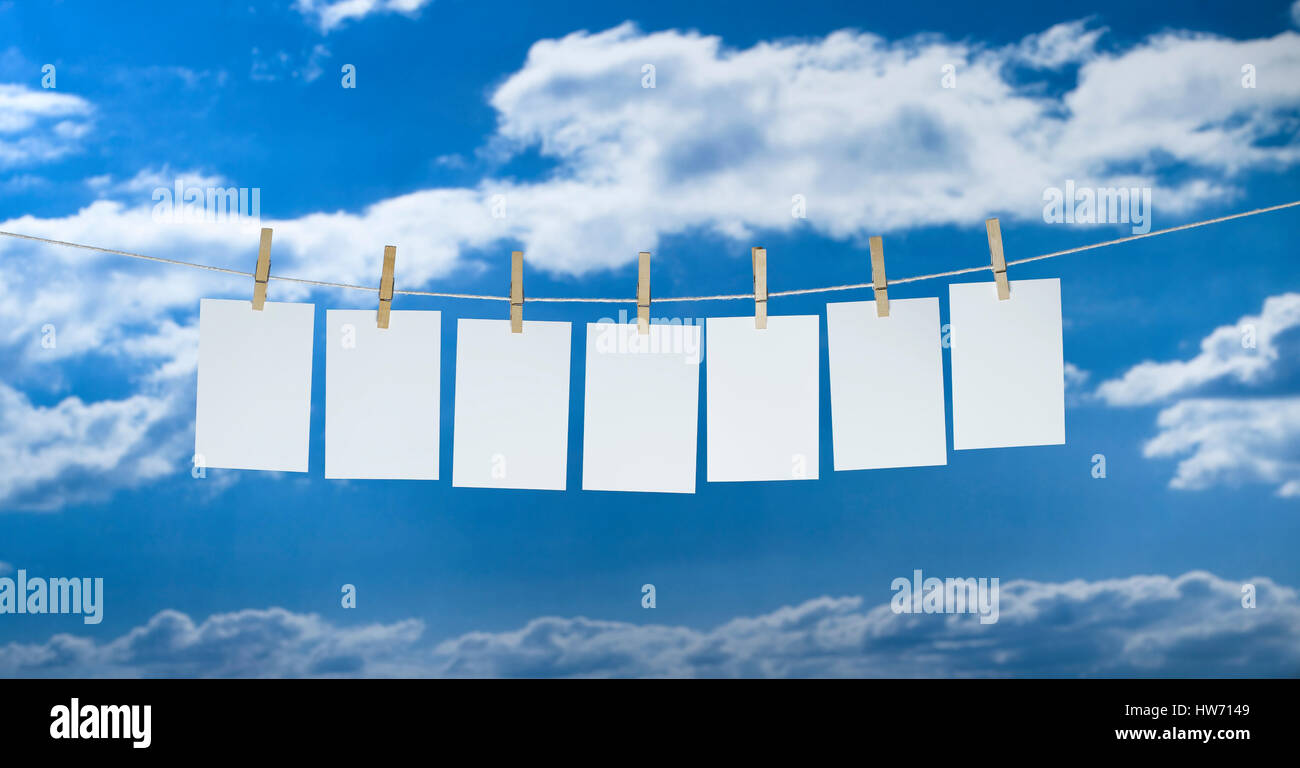 Washing Line with hanging blank paper Stock Photo - Alamy