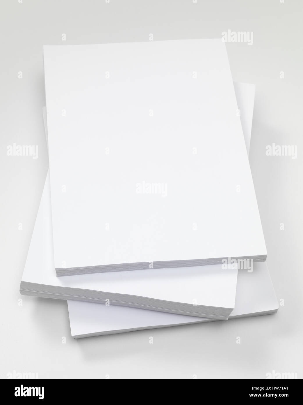 Blank white paper on white Stock Photo - Alamy