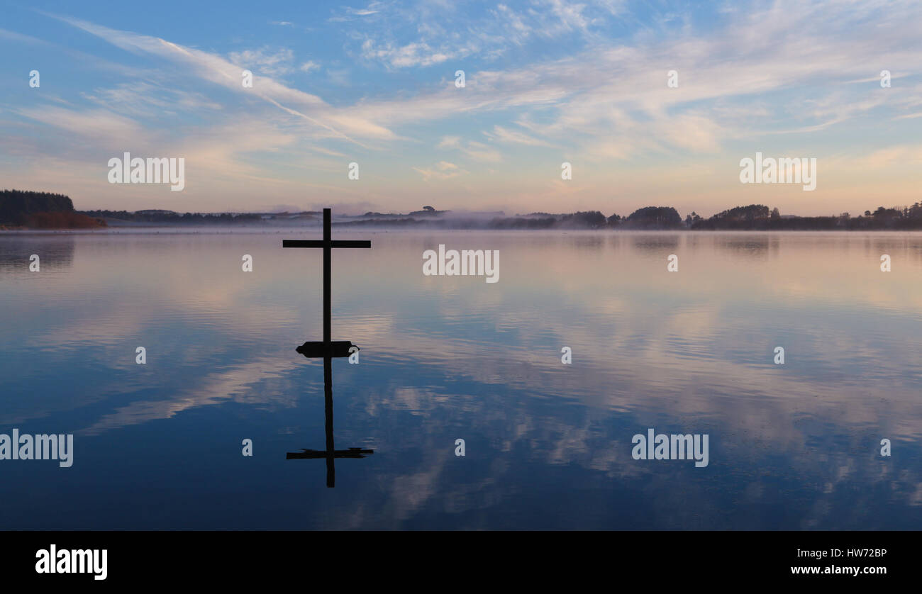 Cross On Water with a beautiful reflection Stock Photo - Alamy