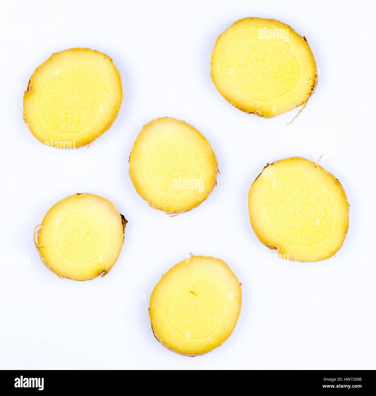 slice of ginger isolated on white background Stock Photo - Alamy