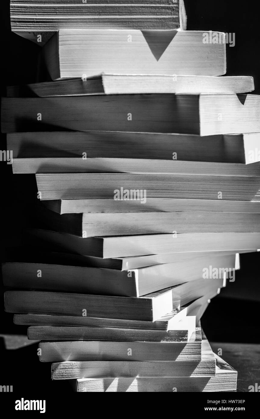 swirl of stacked books in black and white closeup Stock Photo - Alamy