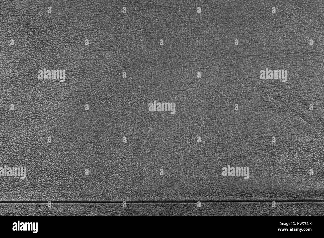 Closeup texture of natural or artificial leather and seam. View from ...