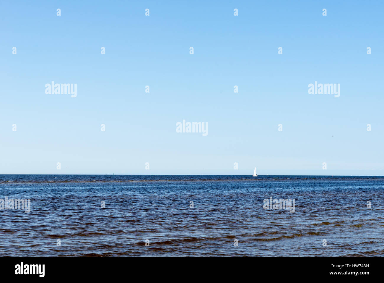 small white ship in the sea Stock Photo - Alamy