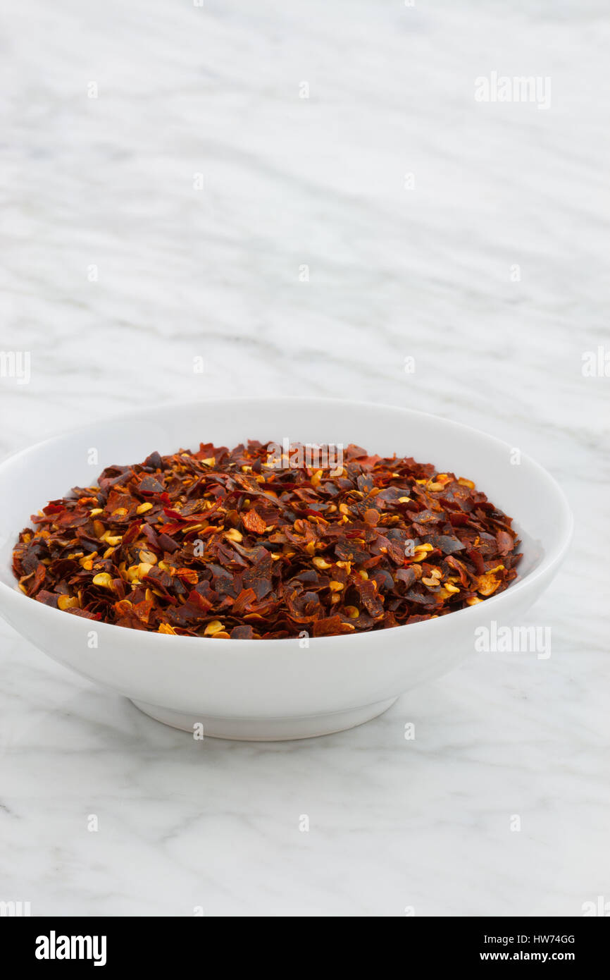 dried red hot pepper flakes spicy and delicious Stock Photo - Alamy