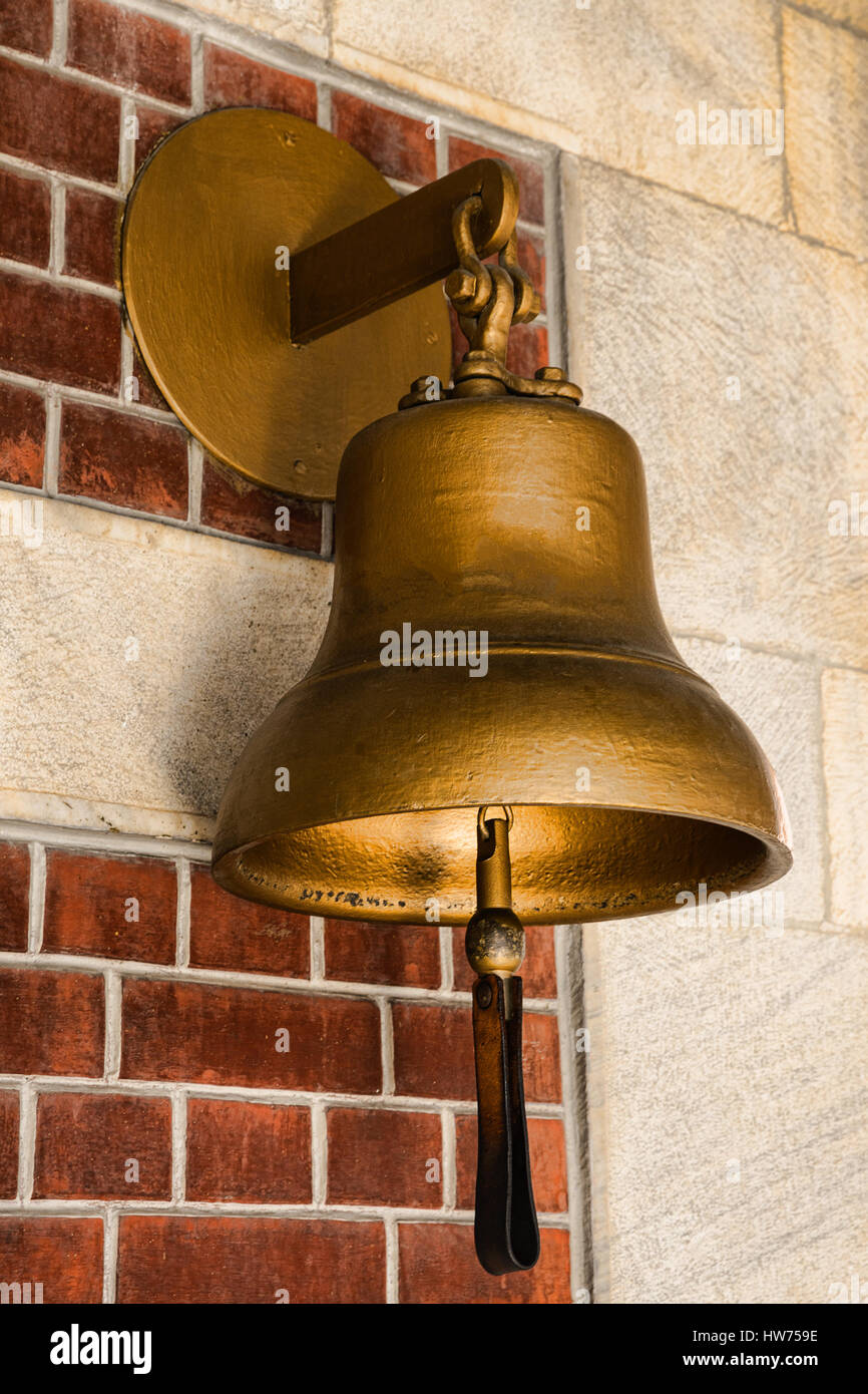 A close up shot of an old vintage brass bell hanging in the Istanbul ...