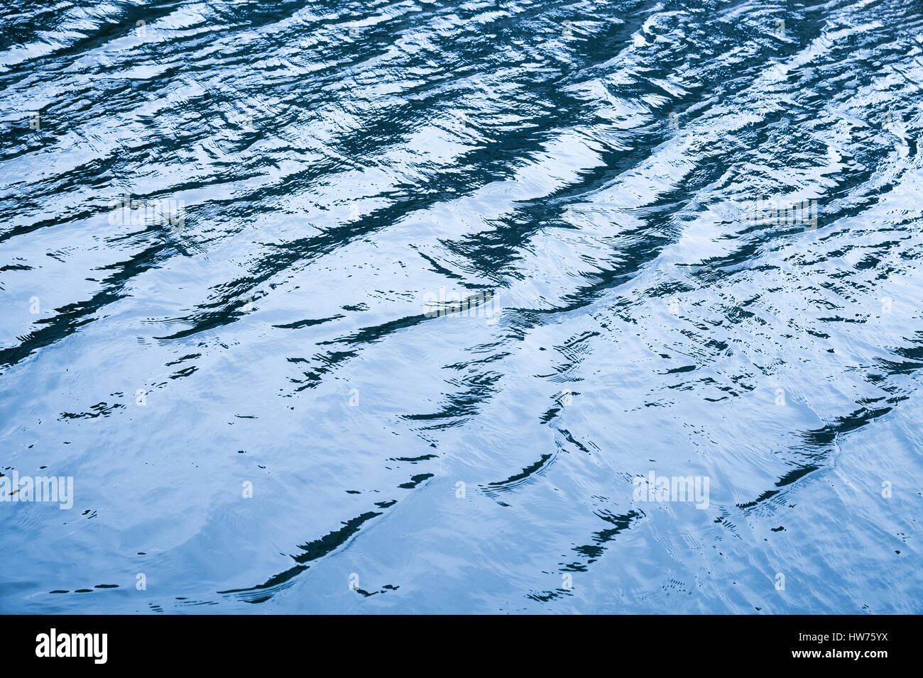 Natural photo background texture of blue sea water surface with ripple ...