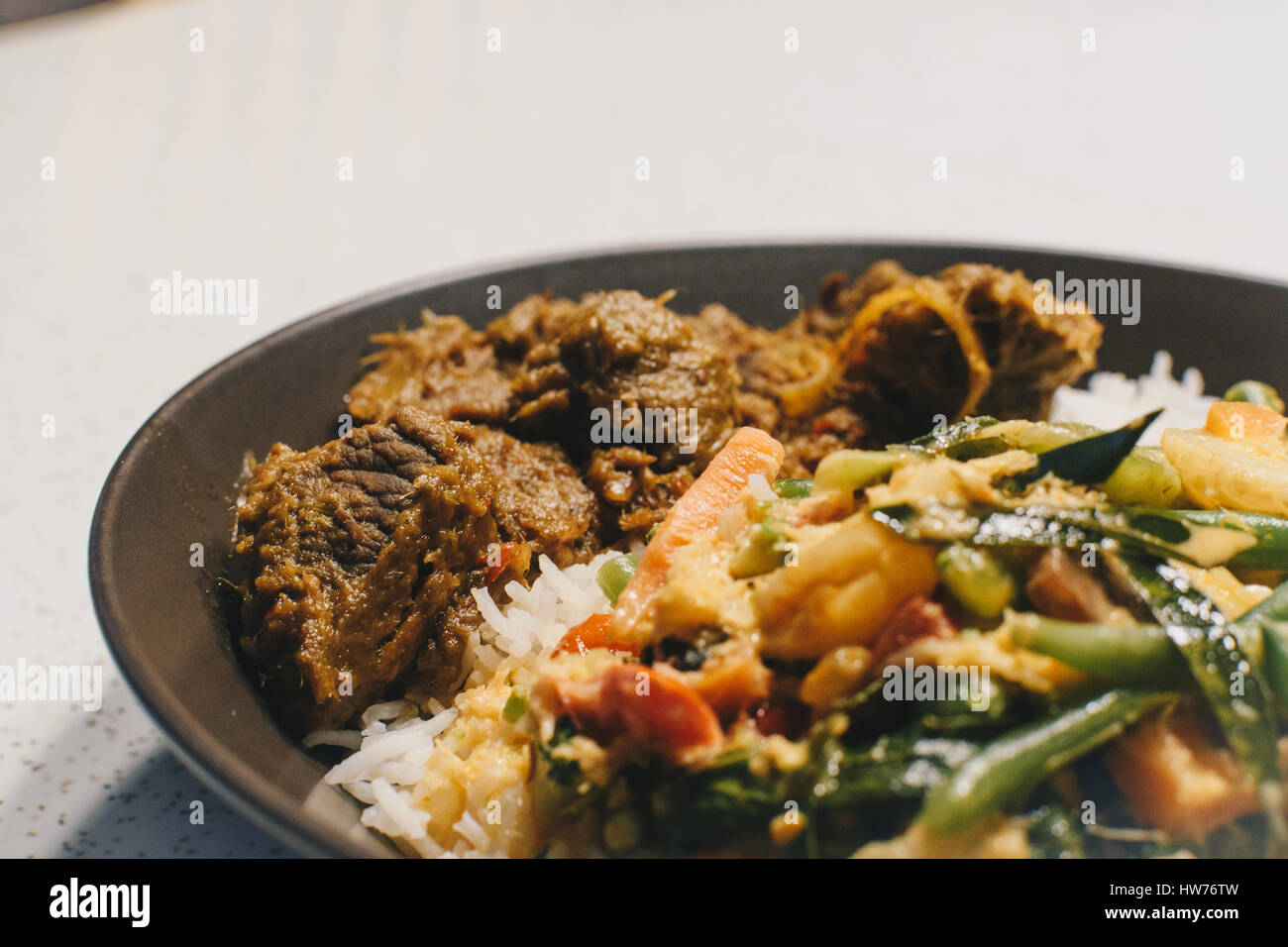 Bowl of Beef rendang Stock Photo - Alamy