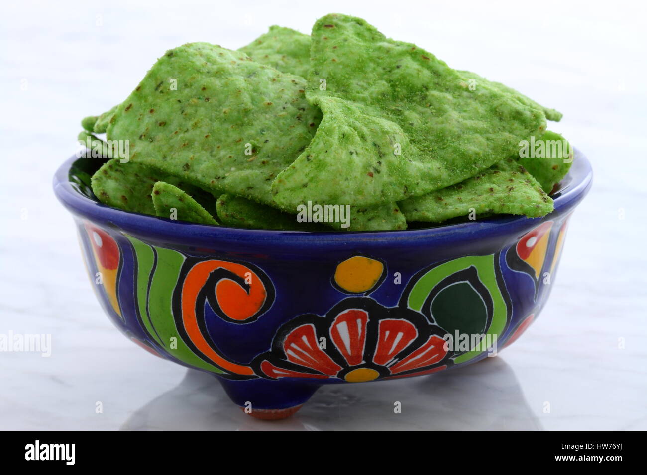 Mexican corn totopos or nacho chips on retro vintage carrara marble ...