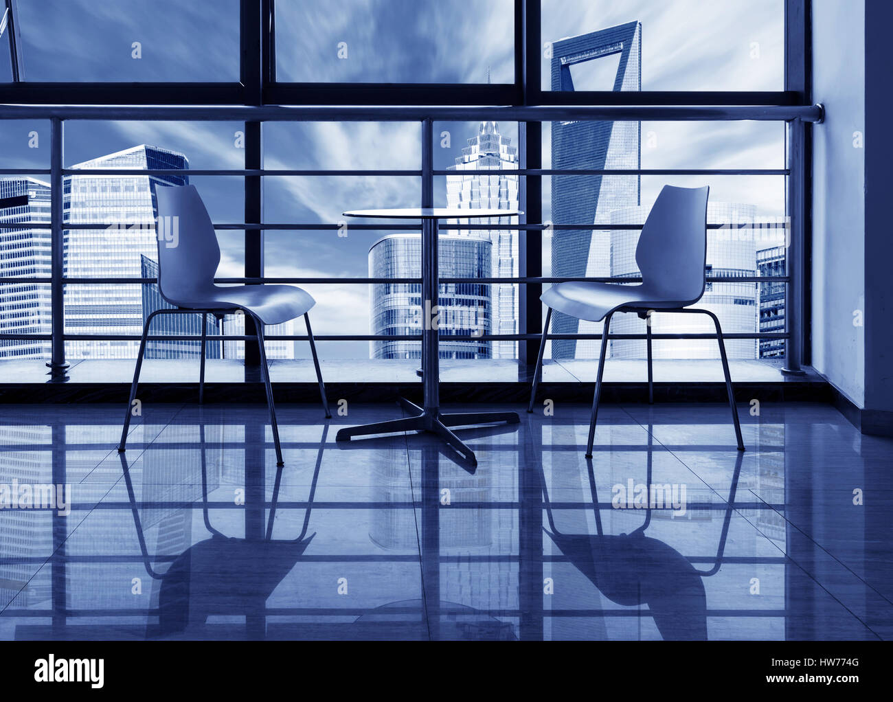 The large windows of the office, out of the window of a skyscraper ...