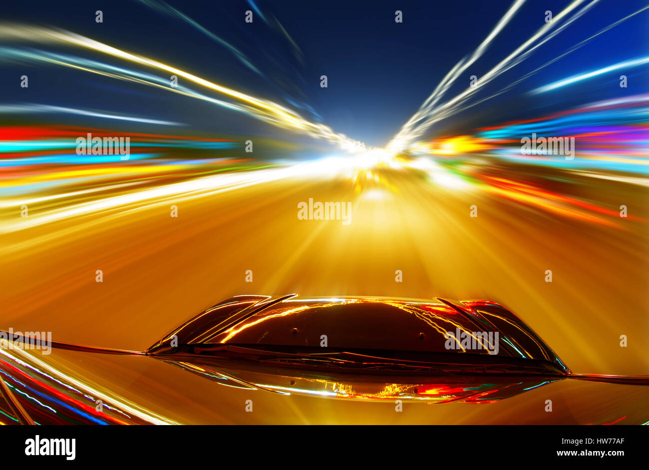 A car driving on a motorway at high speeds, overtaking other cars Stock ...