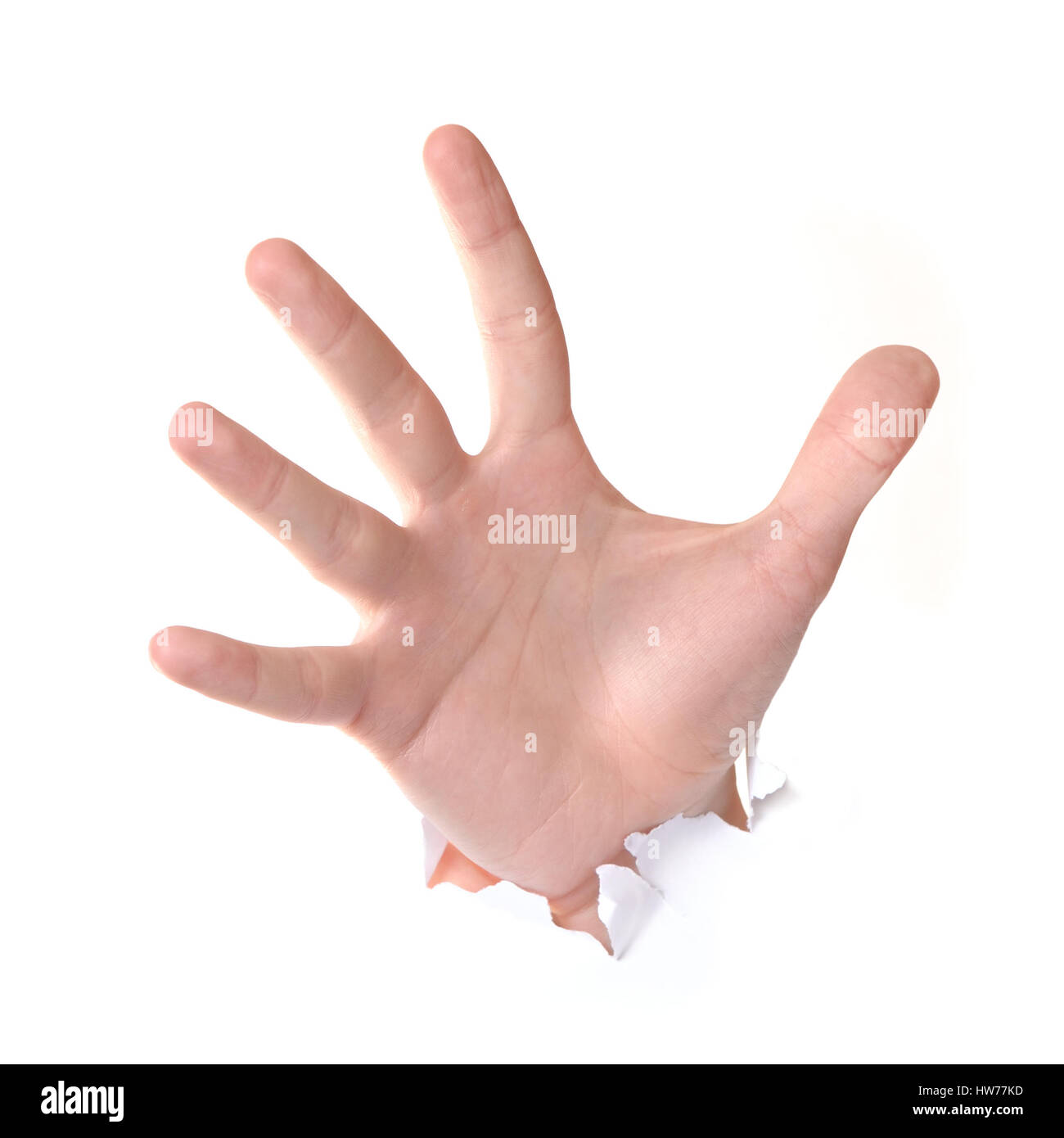Hand punching through paper isolated on white background Stock Photo ...