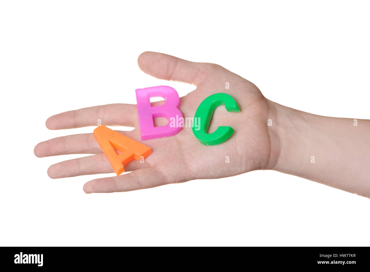 Letters in hand isolated on white background Stock Photo - Alamy