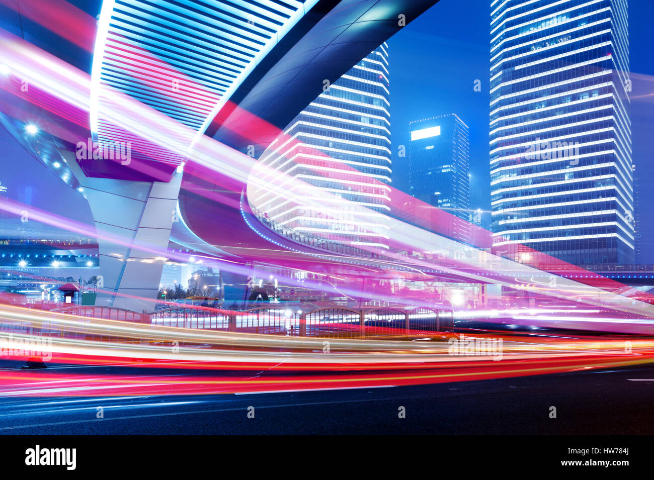 The light trails on the modern building background in shanghai china ...