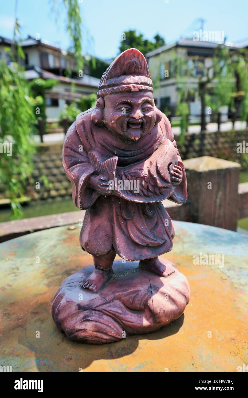 Japanese statue along the canal in Sawara Stock Photo - Alamy