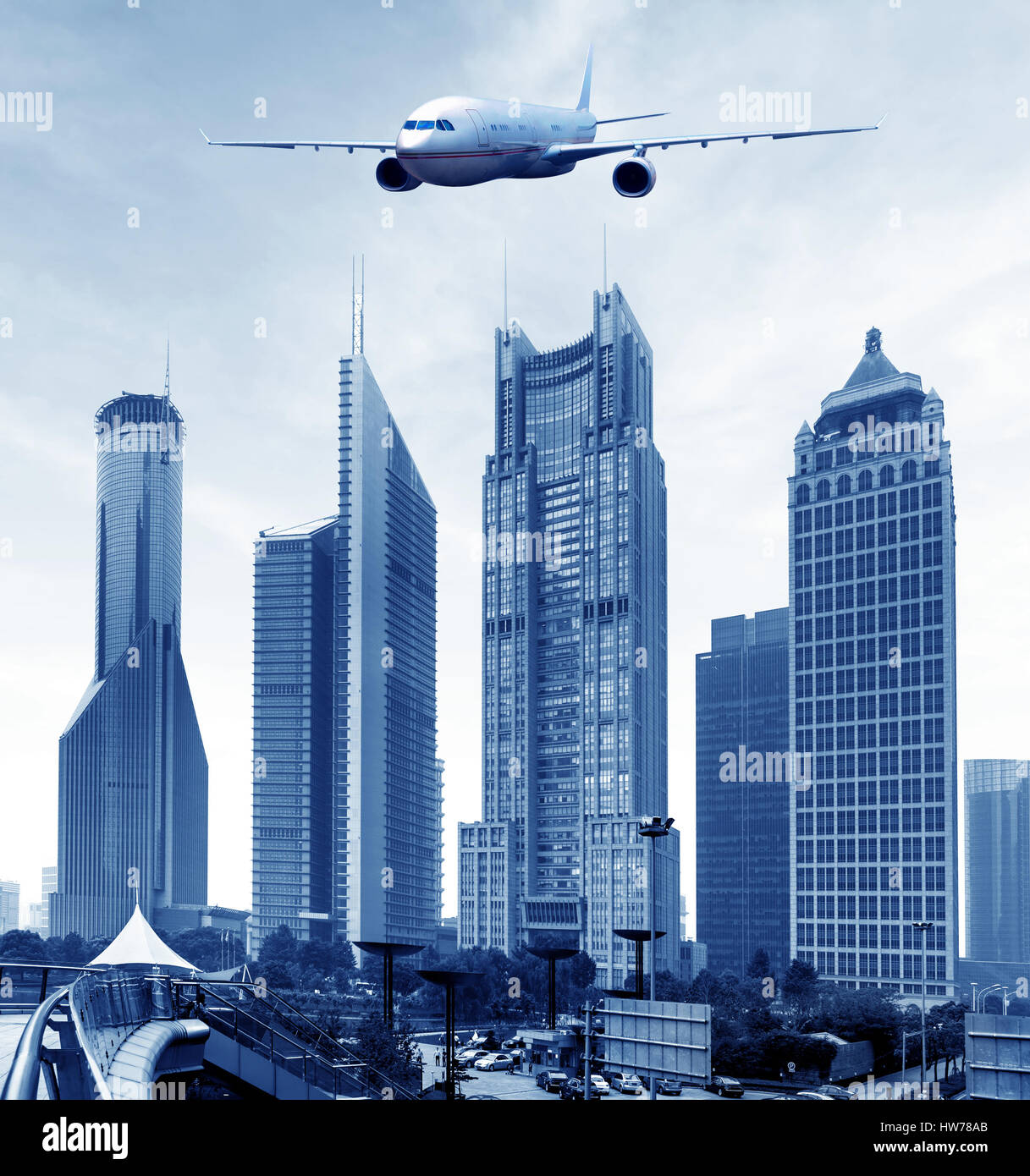 Shanghai's skyscrapers and airplanes on sky Stock Photo - Alamy