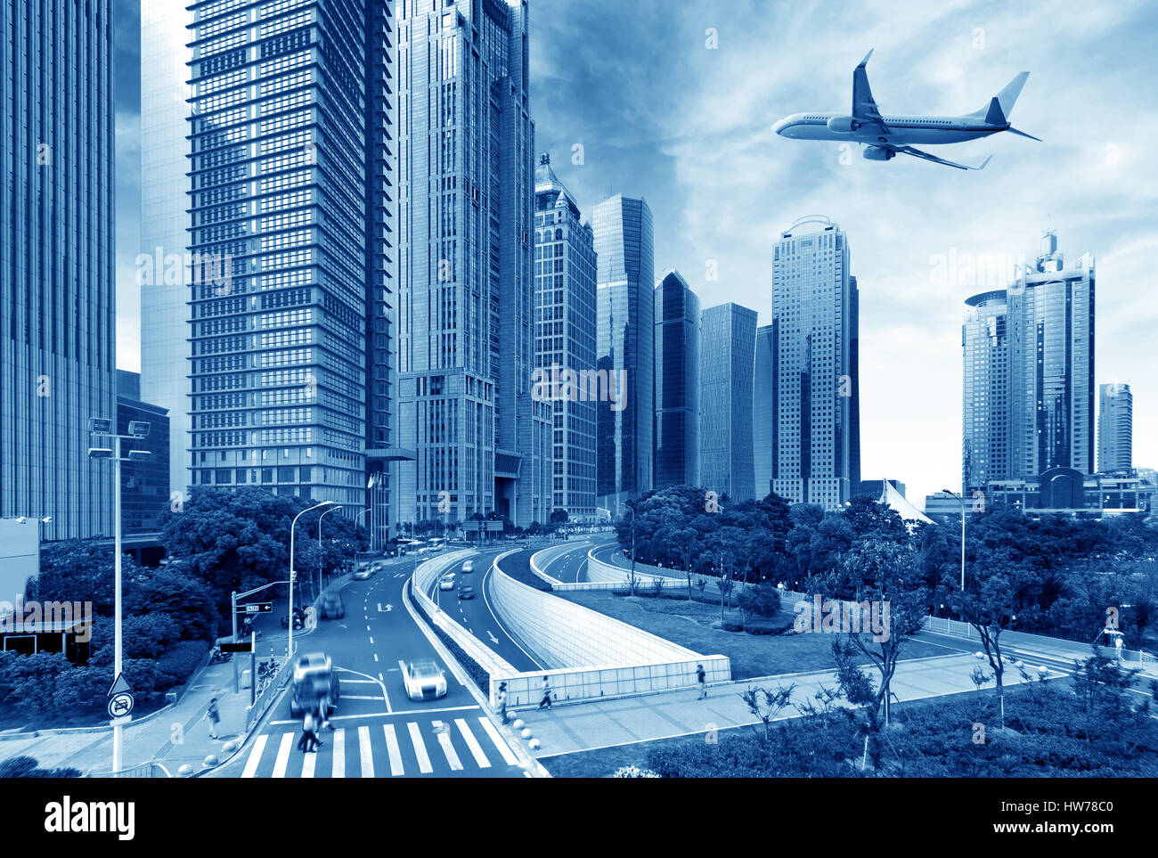 Shanghai's skyscrapers and airplanes on sky Stock Photo - Alamy