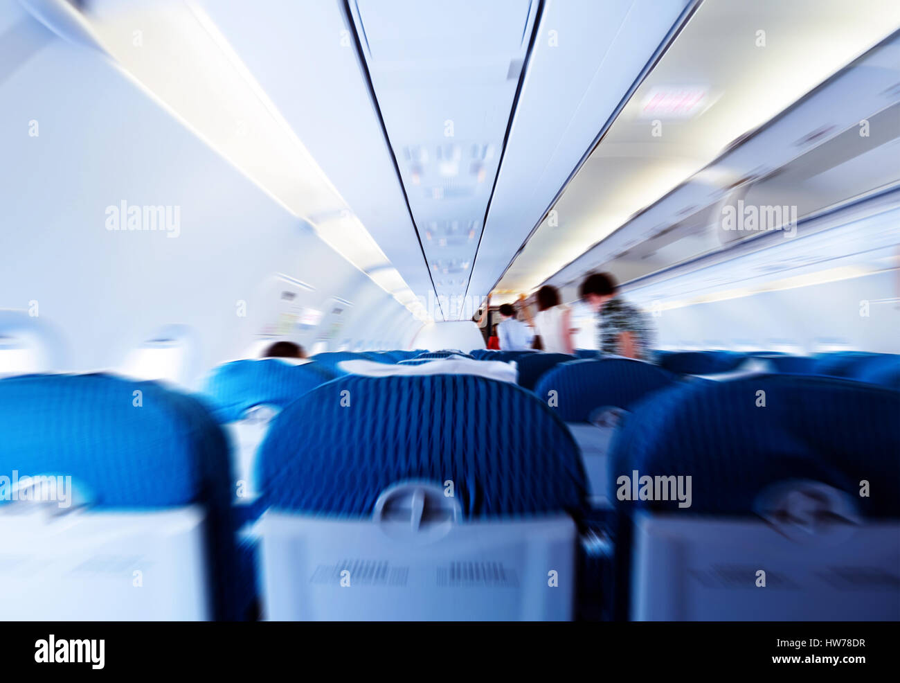 airplane cabin with passengers general view Stock Photo - Alamy