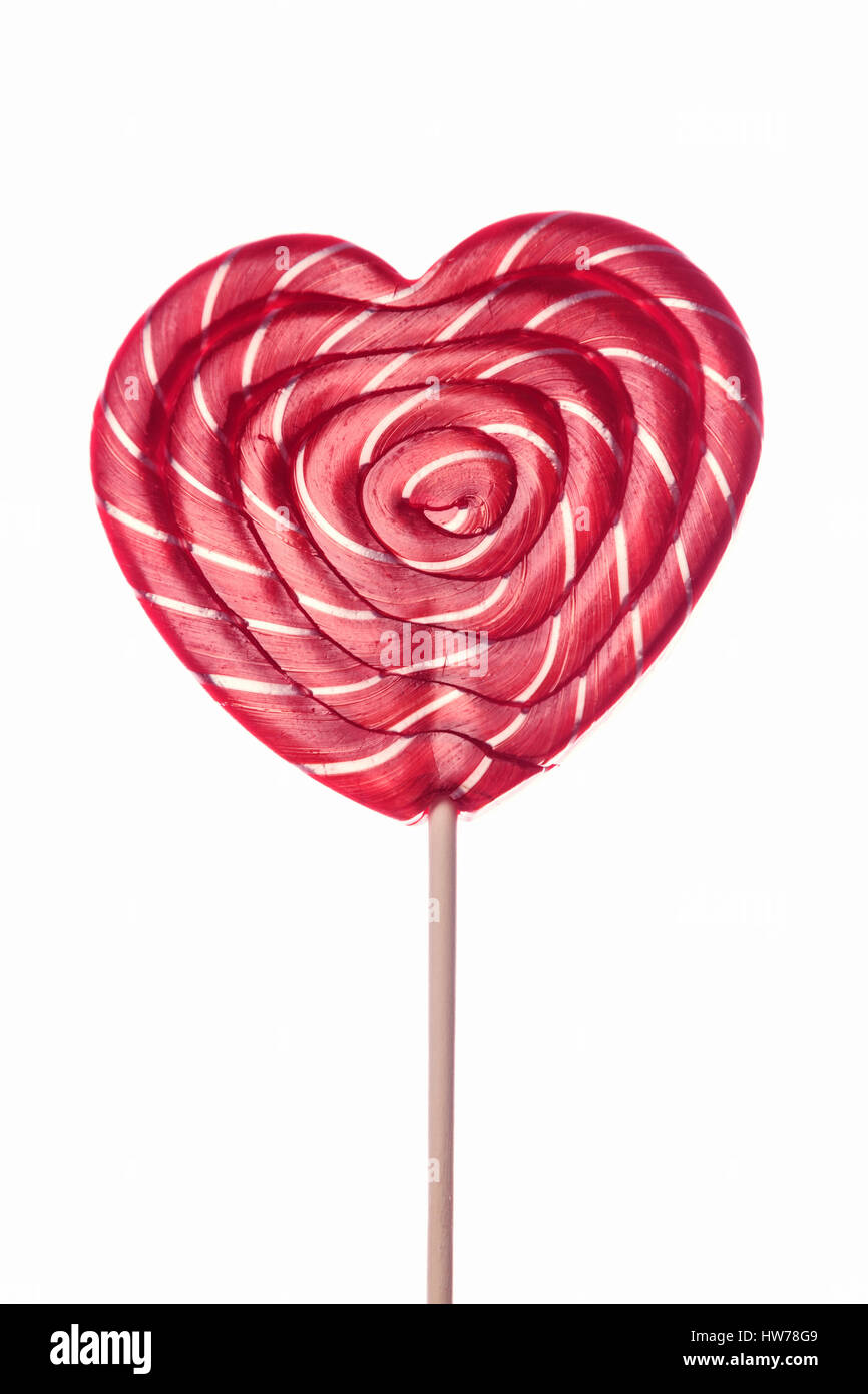 One candy heart shape on white background Stock Photo - Alamy