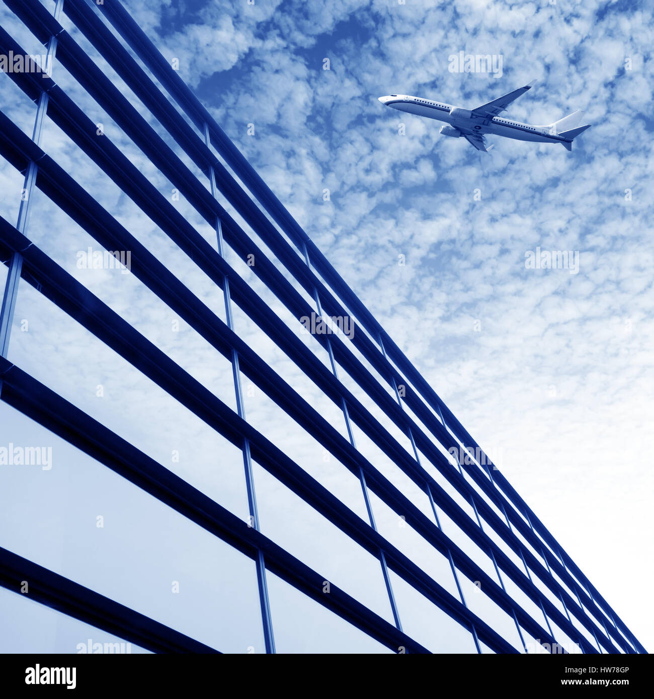 Airplane over the city，High-rise buildings Stock Photo - Alamy