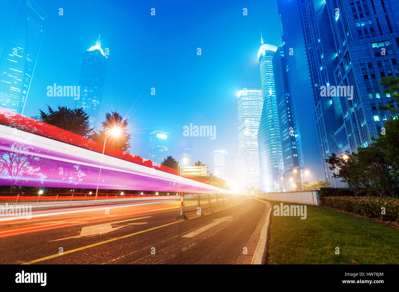The light trails on the modern building background in shanghai china ...