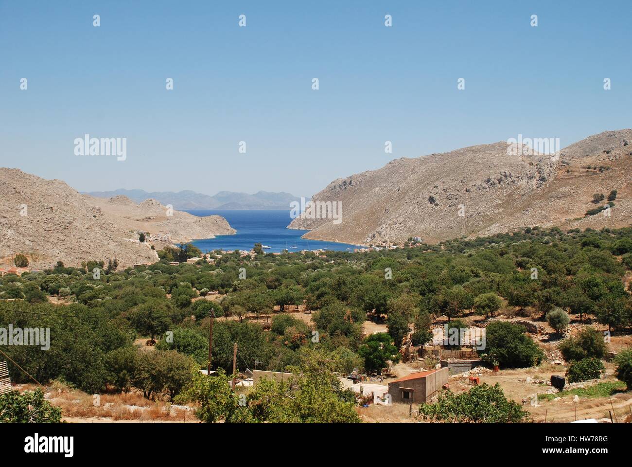 Looking down to Pedi bay on the Greek island of Symi Stock Photo - Alamy