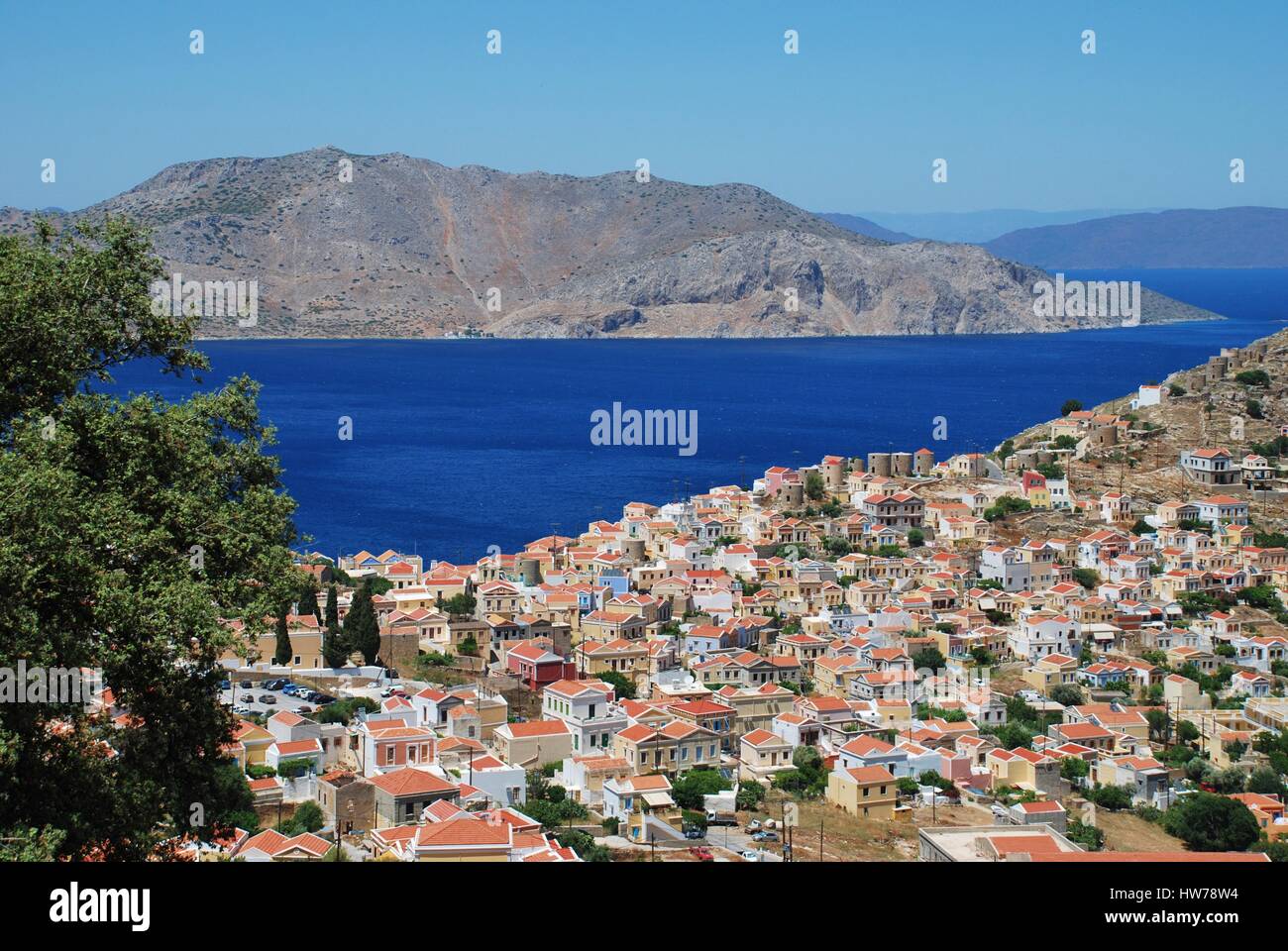 Looking down onto the pastel coloured neo classical buildings of Chorio ...