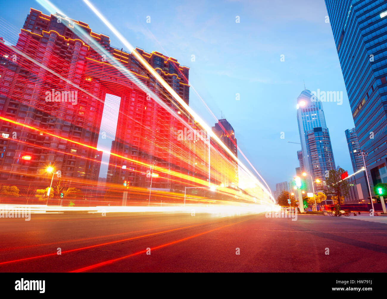 The light trails on the modern building background in shanghai china ...