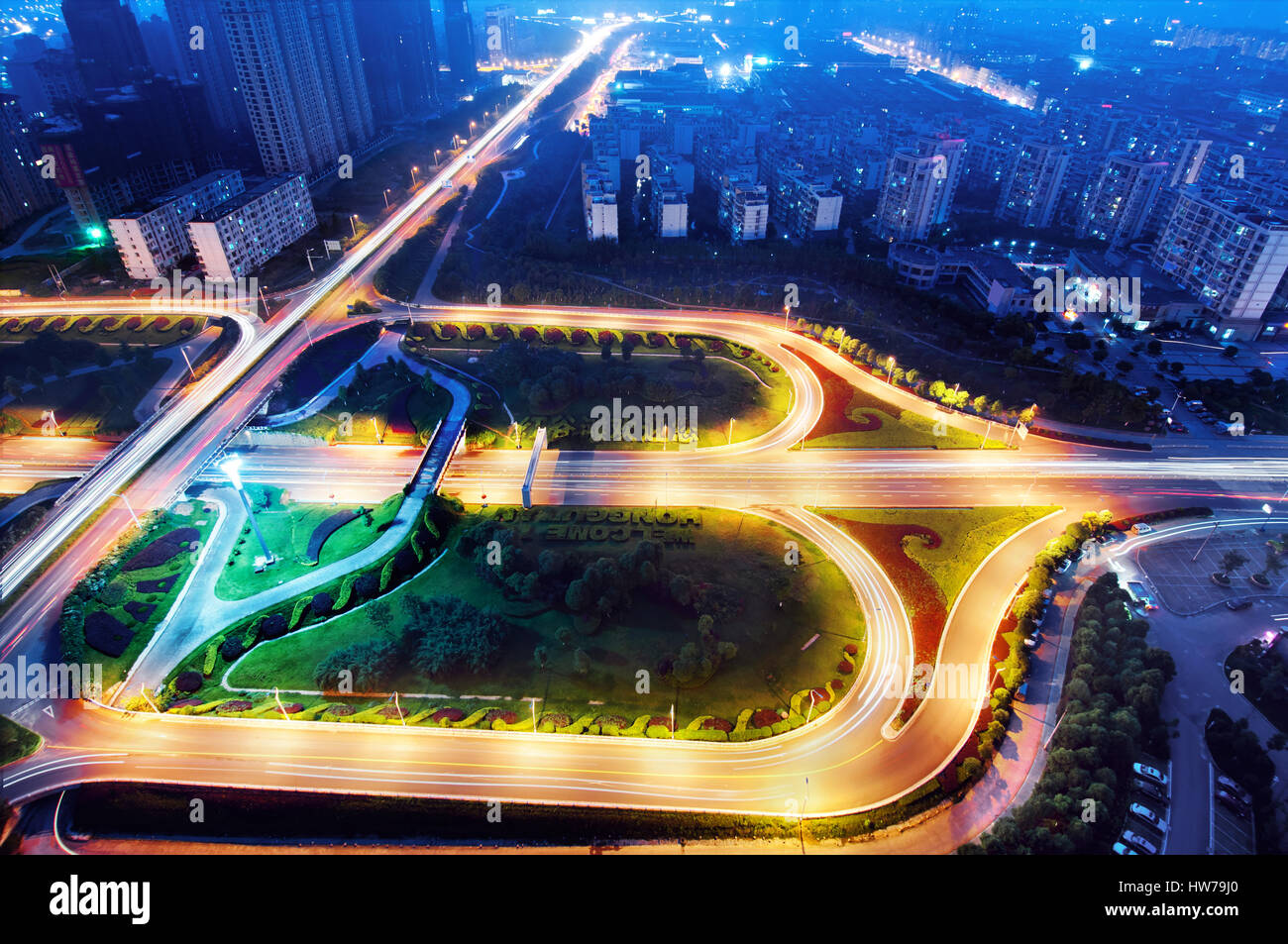 Freeway in night with cars light in modern city Stock Photo - Alamy