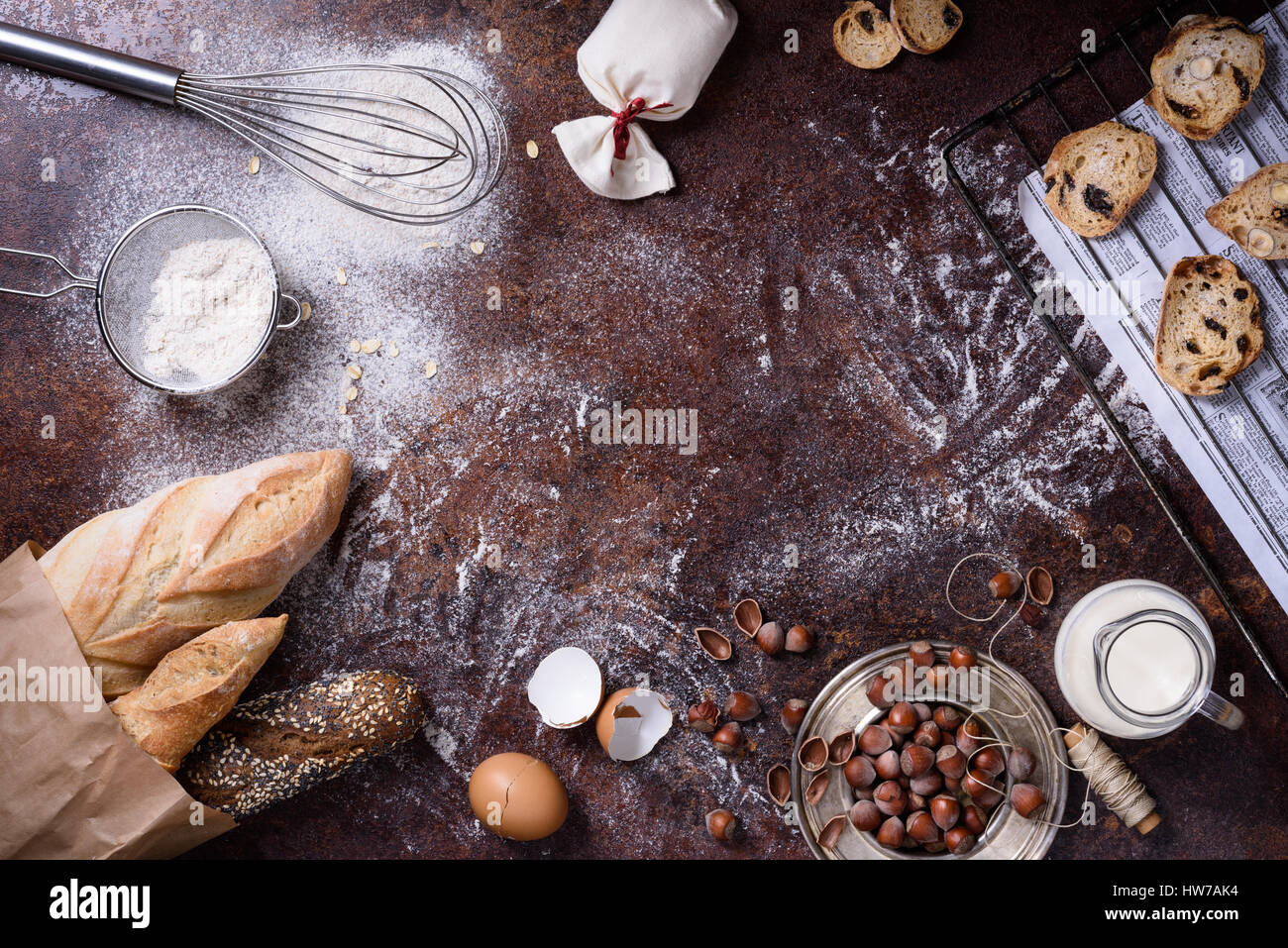 Bakery background, baking ingredients over rustic kitchen table. Baked ...