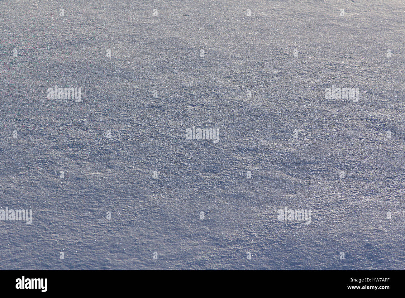 Texture detail on snow surface Stock Photo - Alamy