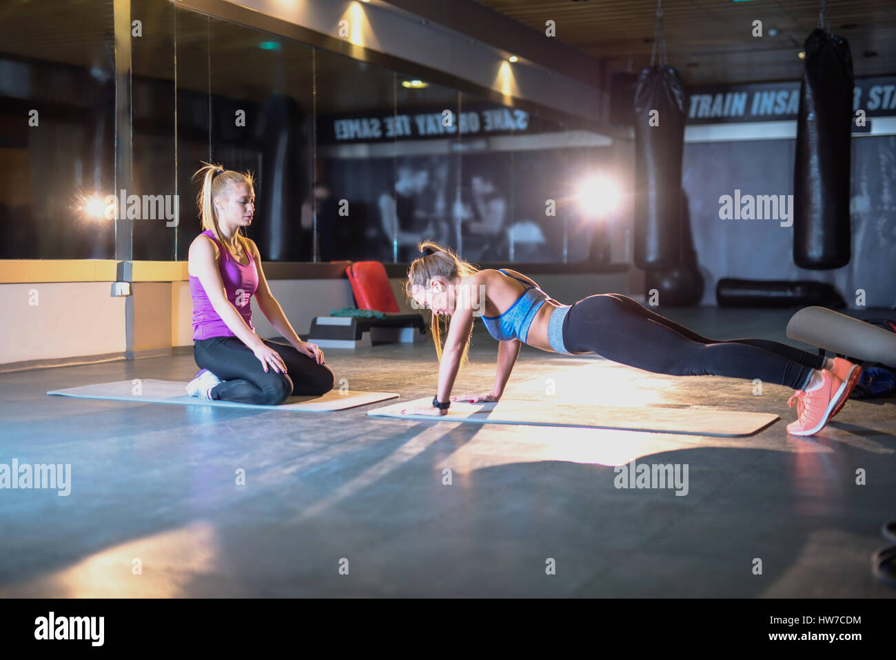 Two beautiful young women on a training class Stock Photo - Alamy