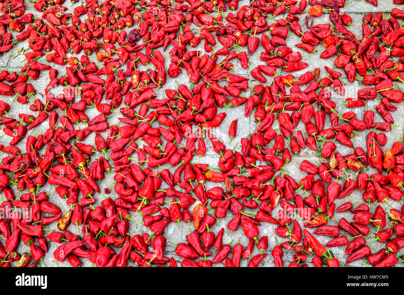 Drying red pepper background Stock Photo - Alamy